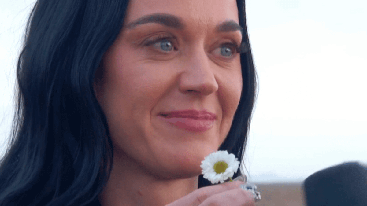 Why Katy Perry really kissed the ground after stepping off capsule that ...